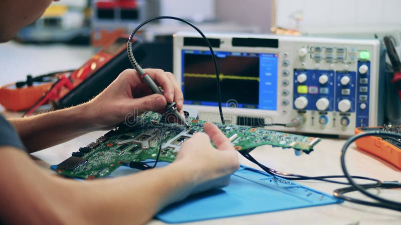 Male Engineer is Soldering Elements of a Circuit Stock Video - Video of ...