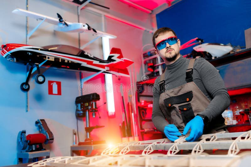 Male Engineer or Technician Working on Drone Details in Lab. Aircraft ...