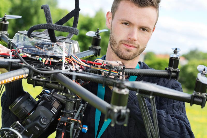 Male Engineer with UAV Helicopter in Park Stock Image - Image of camera ...