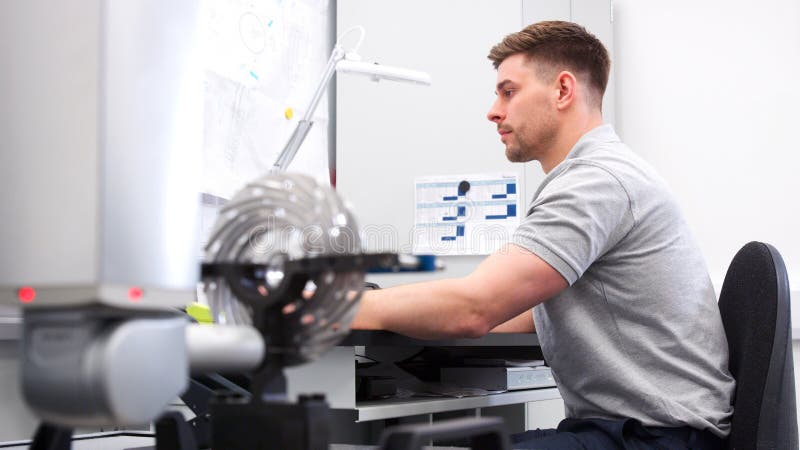 Male Engineer Uses CMM Coordinate Measuring Machine in Factory Stock ...