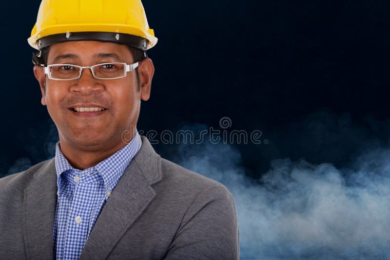 Male Engineer Wear Yellow Helmet with Smoke Stock Image - Image of ...