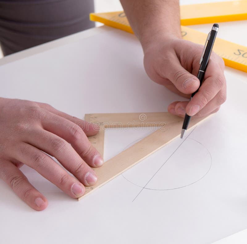 Male Engineer Working on Drawings and Blueprints Stock Photo - Image of ...