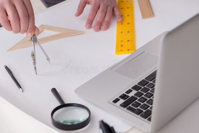 The Male Engineer Working on Drawings and Blueprints Stock Image ...