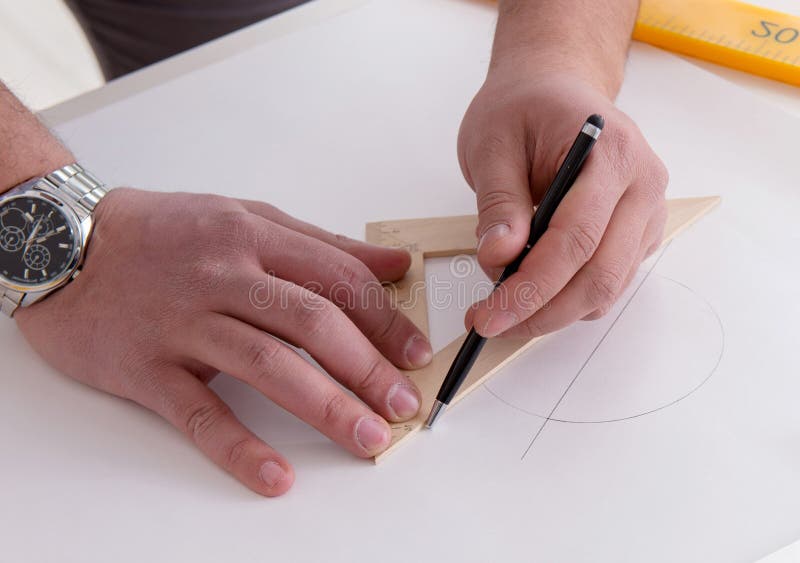 Male Engineer Working on Drawings and Blueprints Stock Photo - Image of ...