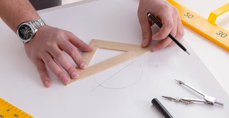 Male Engineer Working on Drawings and Blueprints Stock Image - Image of ...