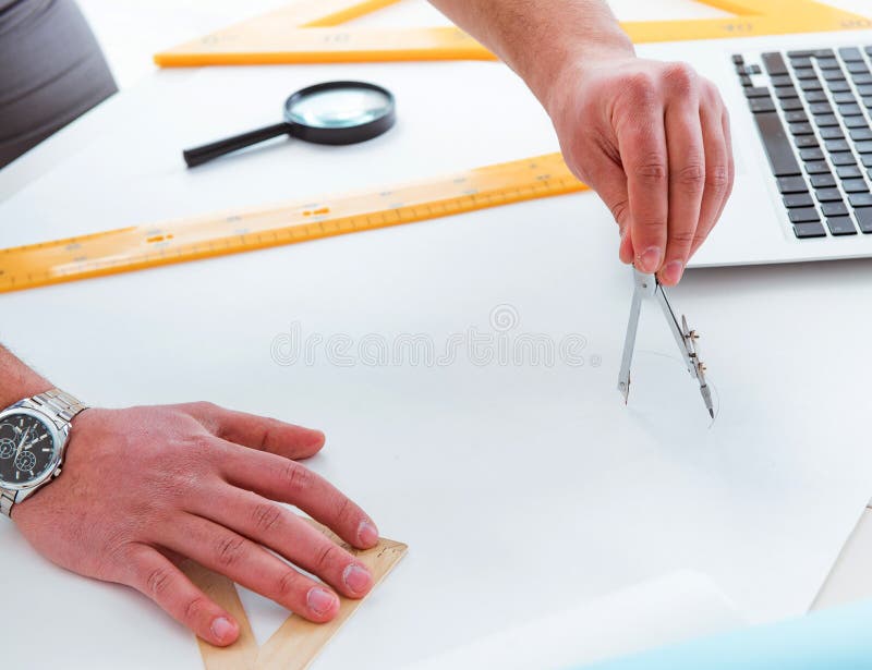 Male Engineer Working on Drawings and Blueprints Stock Photo - Image of ...