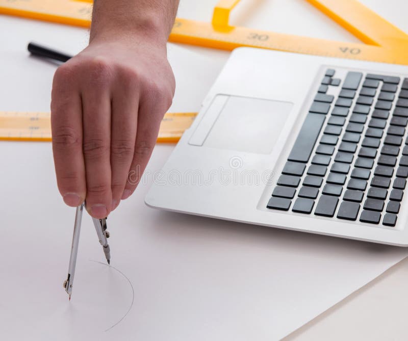 Male Engineer Working on Drawings and Blueprints Stock Photo - Image of ...
