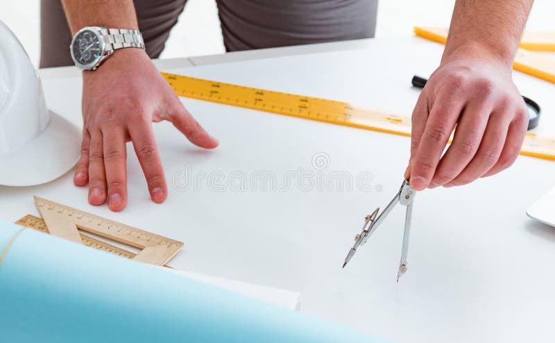 Male Engineer Working on Drawings and Blueprints Stock Image - Image of ...