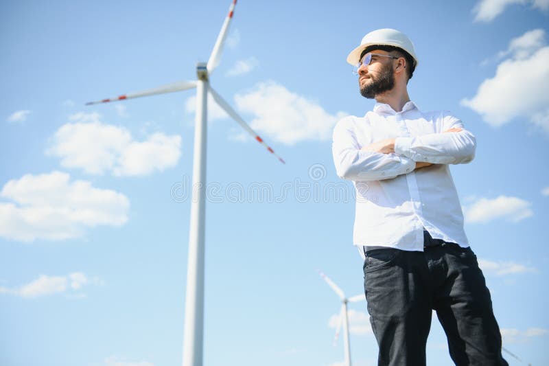 Male Engineer Working with Plan Inspecting or Maintenance of Wind ...