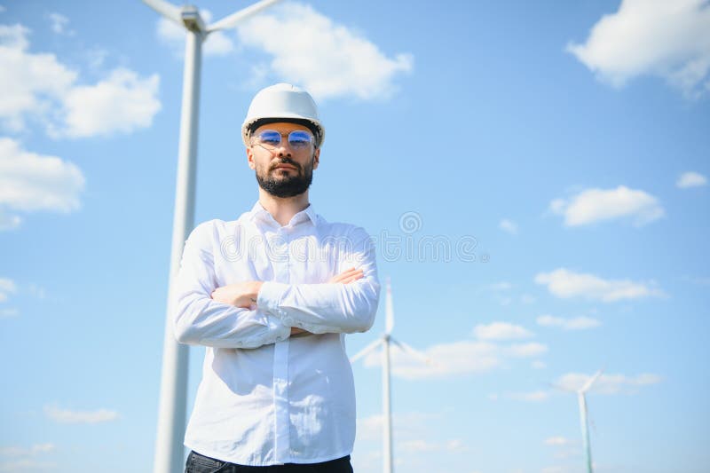 Male Engineer Working with Plan Inspecting or Maintenance of Wind ...