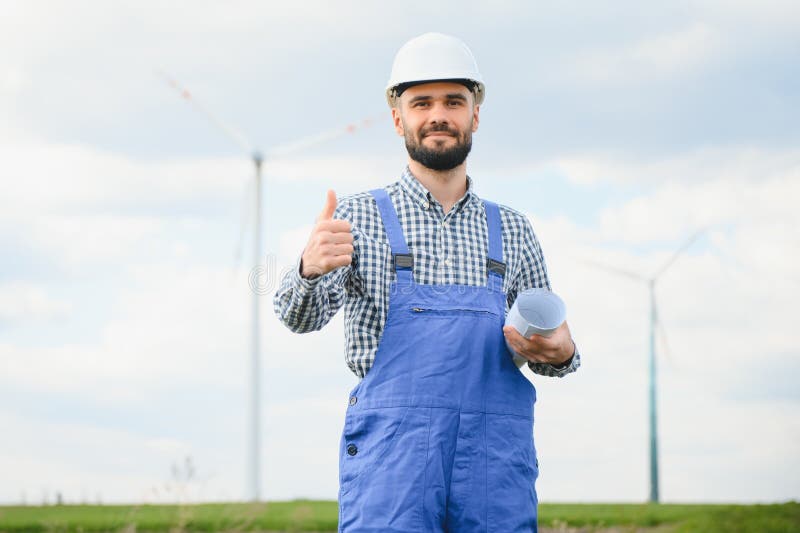 Male Engineer Working with Plan Inspecting or Maintenance of Wind ...
