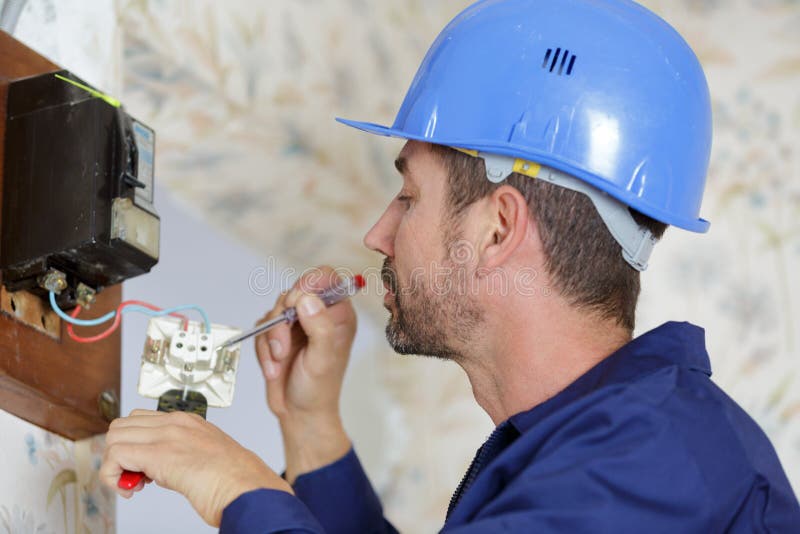 Male Engineer Working with Socket Stock Image - Image of lightswitch ...