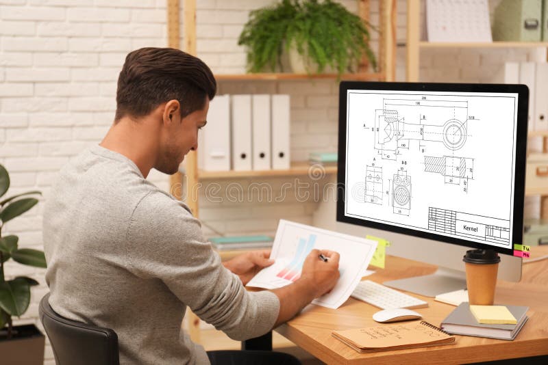 Male Engineer Working with Technical Drawing on Computer, Top View ... Male Engineer Working with Technical Drawing on Computer, Top View ...