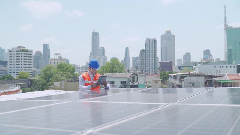 Male Engineers Using Radio in the Area of the Solar Panel. Foreman ...