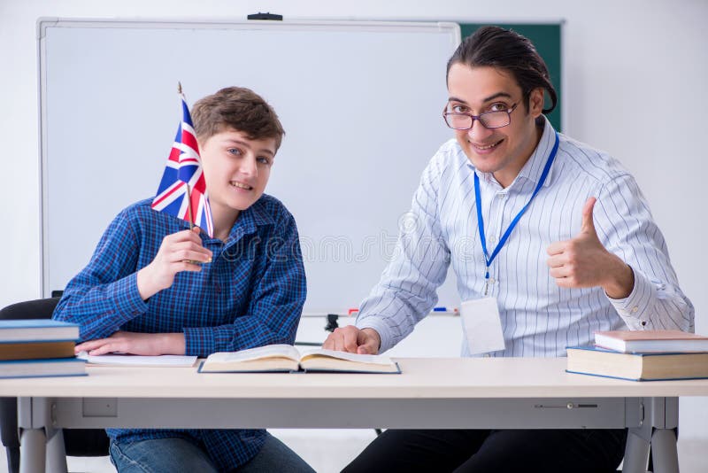 Male English Teacher and Boy in the Classroom Stock Photo - Image of ...