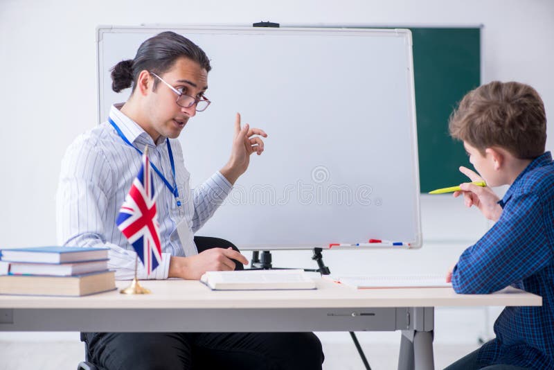 Male English Teacher and Boy in the Classroom Stock Image - Image of ...