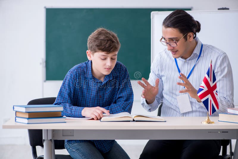 Male English Teacher and Boy in the Classroom Stock Image - Image of ...