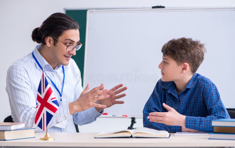 Male English Teacher and Boy in the Classroom Stock Photo - Image of ...