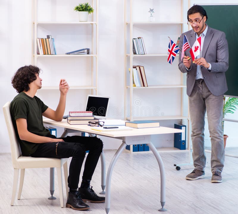 Male English Teacher and Student in the Classroom Stock Image - Image ...