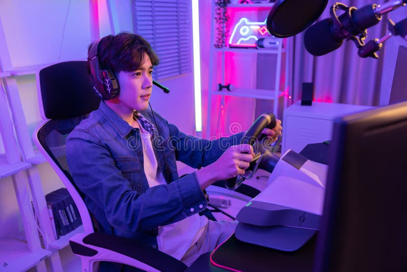 Male Esport Gamer with Car Steering Wheel Joy Controller Playing ...