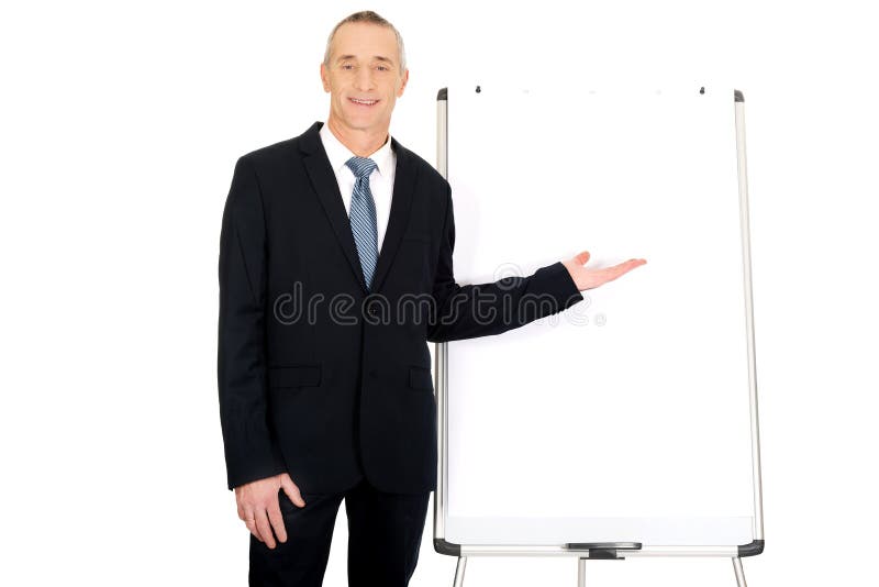 Male Executive Presenting on Flip Chart Stock Photo - Image of chart ...