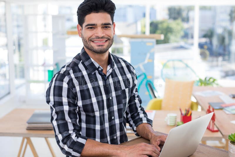 Male Executive Working on Laptop at Desk Stock Image - Image of happy ...