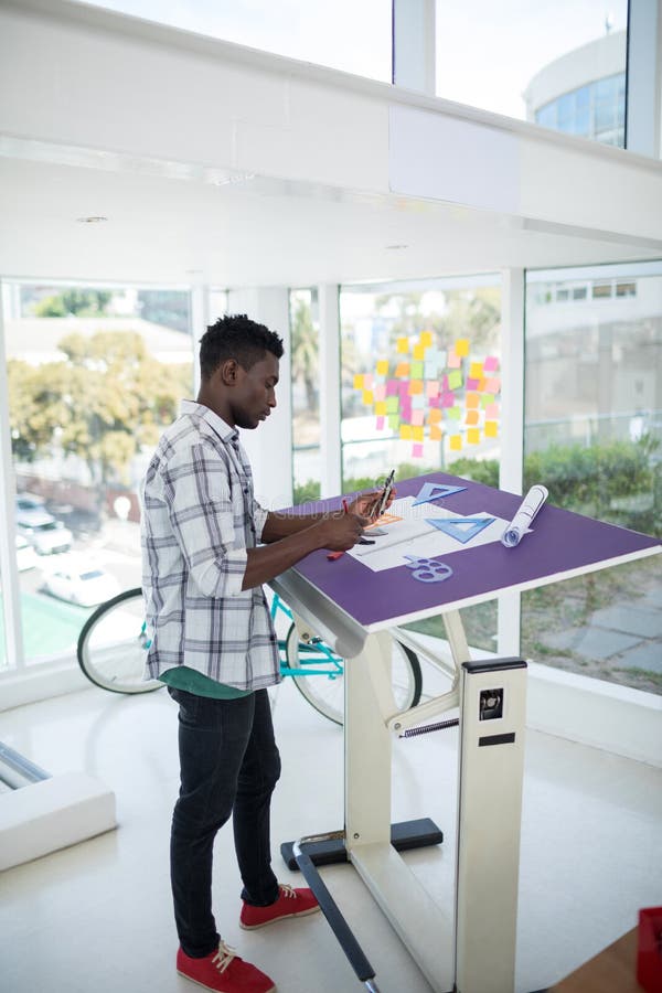 Cat, with Paw on Drafting Table, Designing Futuristic Cityscape Stock ...