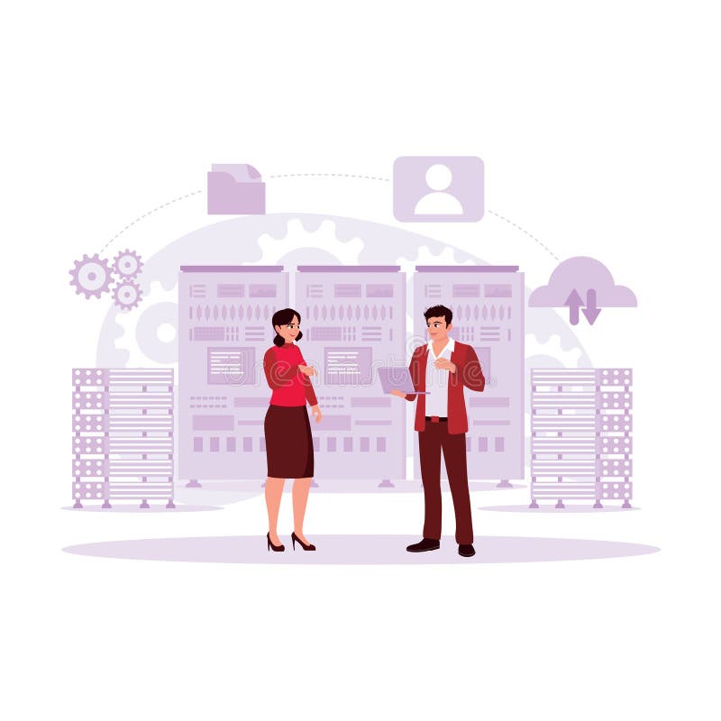 A Male it Expert Working on a Laptop, Discussing System Problems with a ...