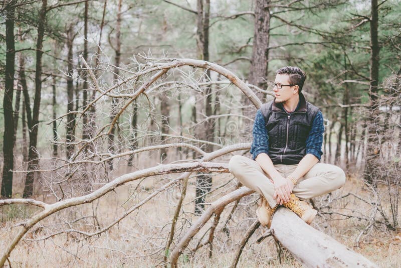 Male Explorer Rests in the Woods. Stock Photo - Image of explorer ...
