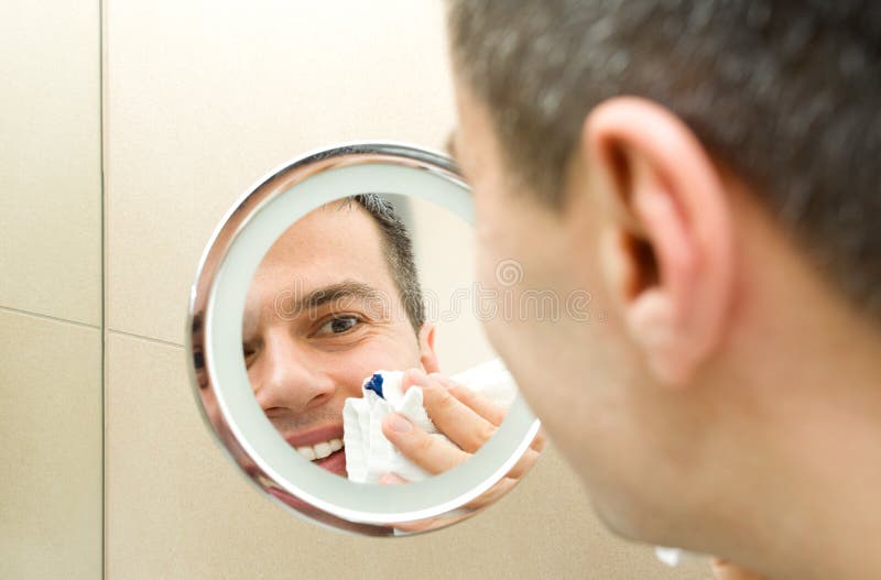 Male face in mirror stock photo. Image of beautycare - 50397854