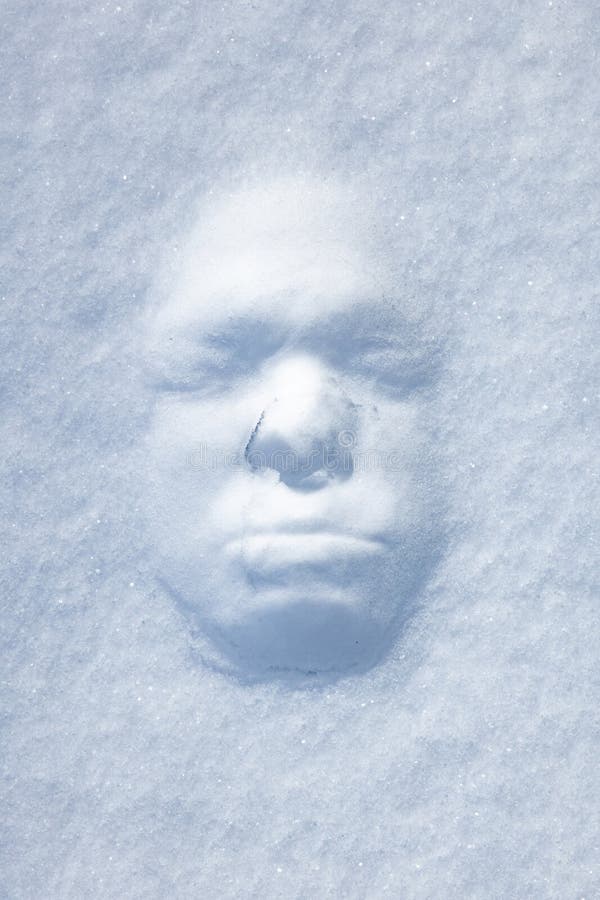 Male Face Print in a Snowdrift on a Winter Day Stock Photo - Image of ...