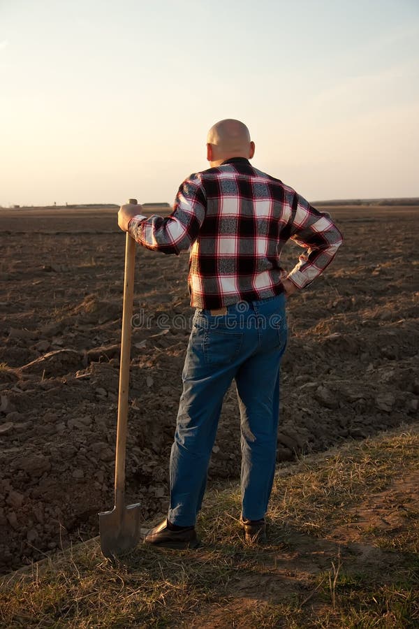 Male Farmer with Spade Back Stock Image - Image of equipment ...