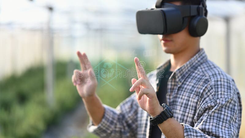 Male Farmer in VR Headset and Interacting with Virtual Reality ...