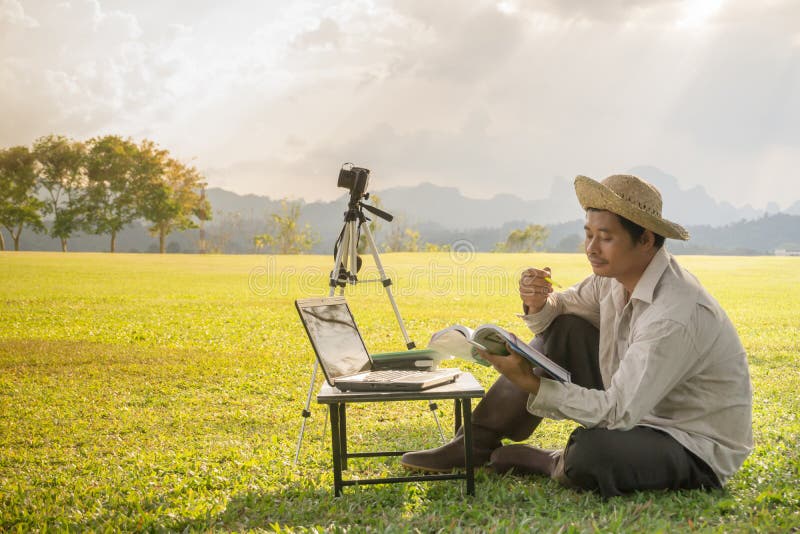 Male Farmers are Learning and Planning To Develop Farms. Stock Image ...