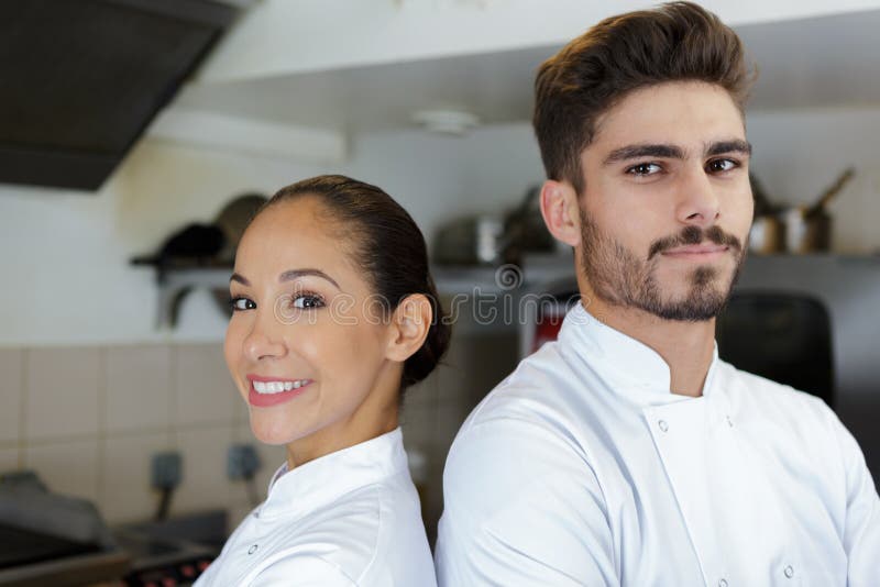 Male and Female Chefs Back To Back Stock Photo - Image of happiness ...