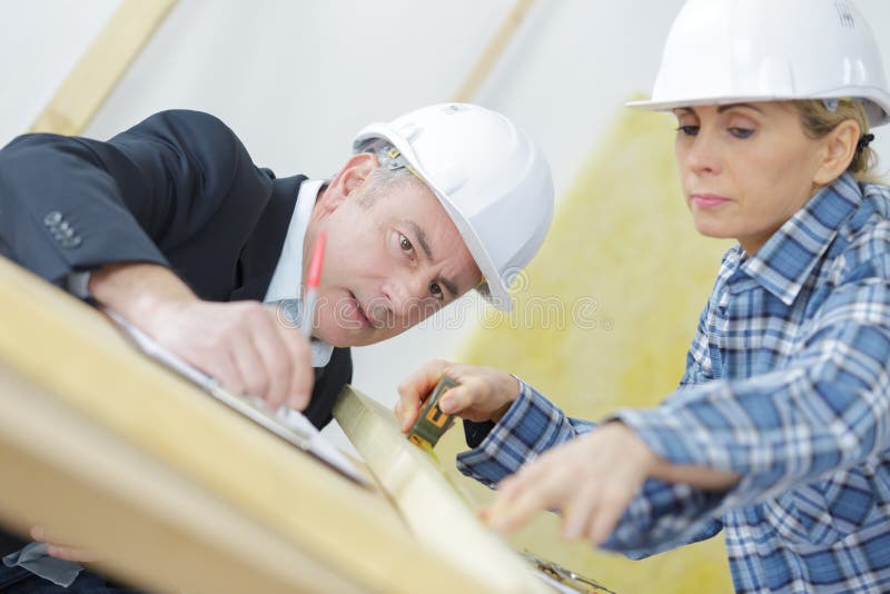 Male and Female Civil Engineers Working Together Stock Image - Image of ...