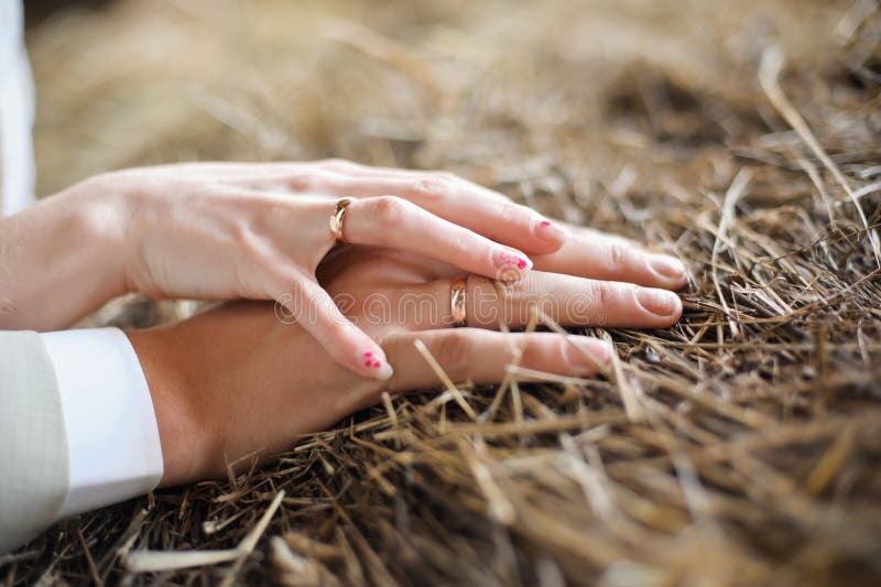Male and Female Hand on Straw Stock Image - Image of looking, hands ...