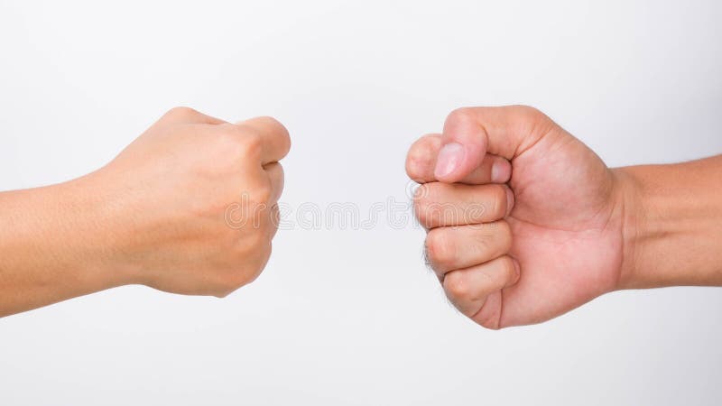 Male And Female Hands Giving Fist Bump On White Background Concept Of