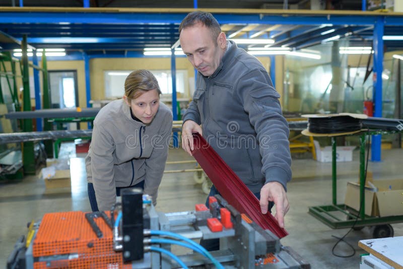 Male and Female Manual Workers in Industry Stock Image - Image of ...