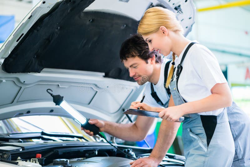 Mechanic Team Working in Car Workshop Stock Image - Image of occupation ...
