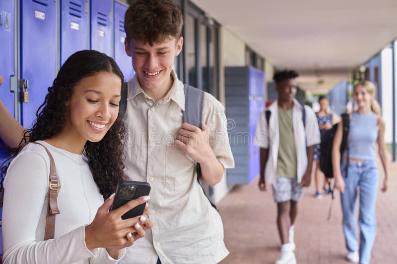 Two Female Secondary or High School Students Outdoors at School Posing ...