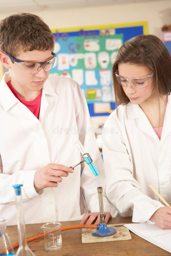 Female Teenage Student and Tutor in Science Class Stock Image - Image ...