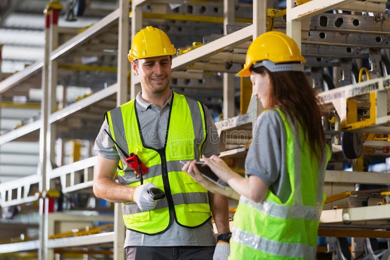 Male and Female Using Tablet and Use Bar Code Reader while Scanning ...