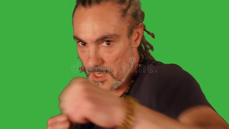 Male Fighter Doing Fight Boxing Practice Training Isolated on Green ...