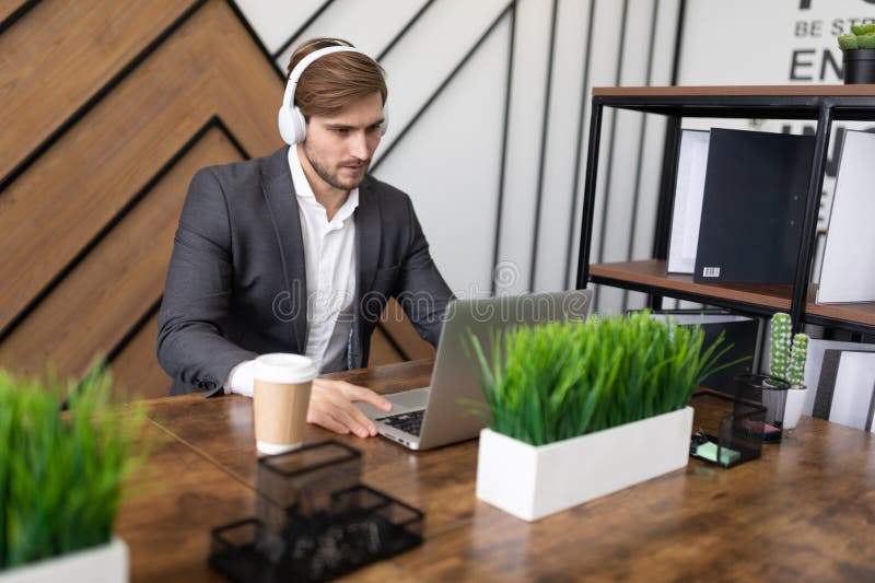 Male Financial Analyst is Busy Working in the Office Using Pc Stock ...