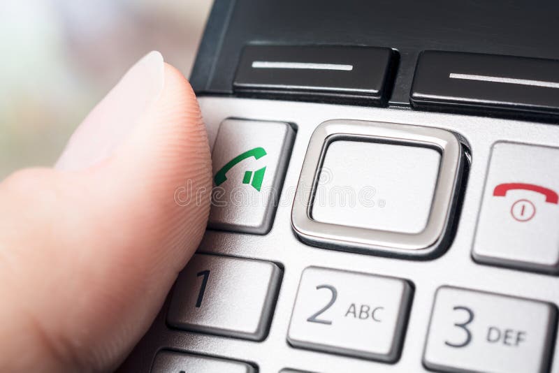 Male Finger on the Call Button of a Wireless DECT Telefphone, Ready To ...