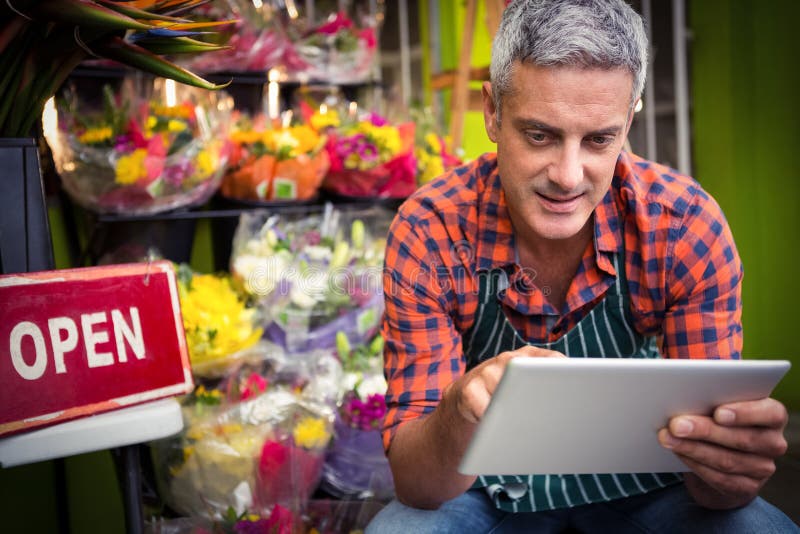 Male Florist Using Digital Tablet Stock Image - Image of occupation ...