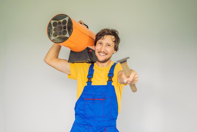 Male Foreman for Installing Stretch Ceilings with Air Heater Stock ...