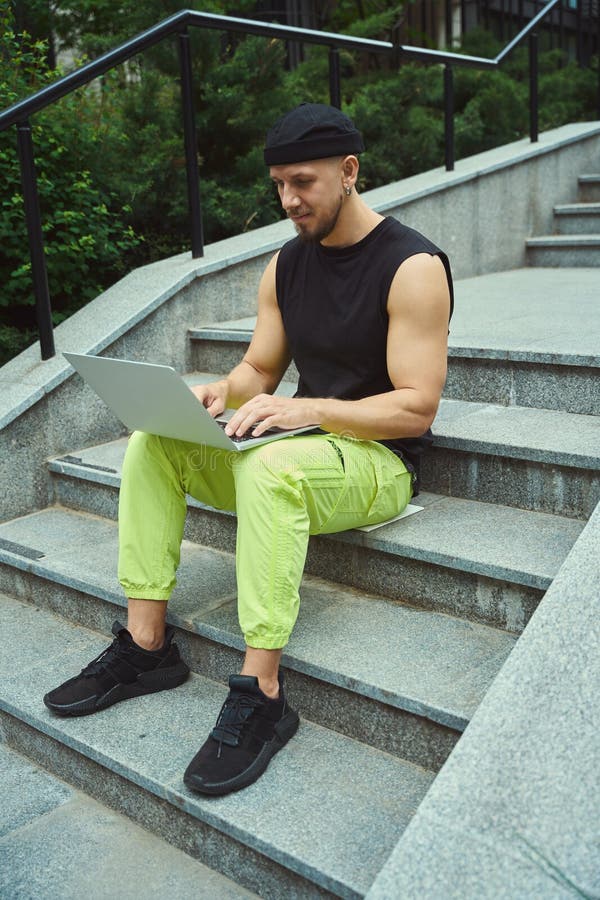 Male Freelancer Doing Work Assignments in Park Stock Photo - Image of ...