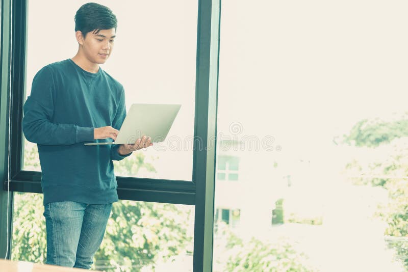 Male Freelancer Working with Computer. Startup Man Analyzing Data ...